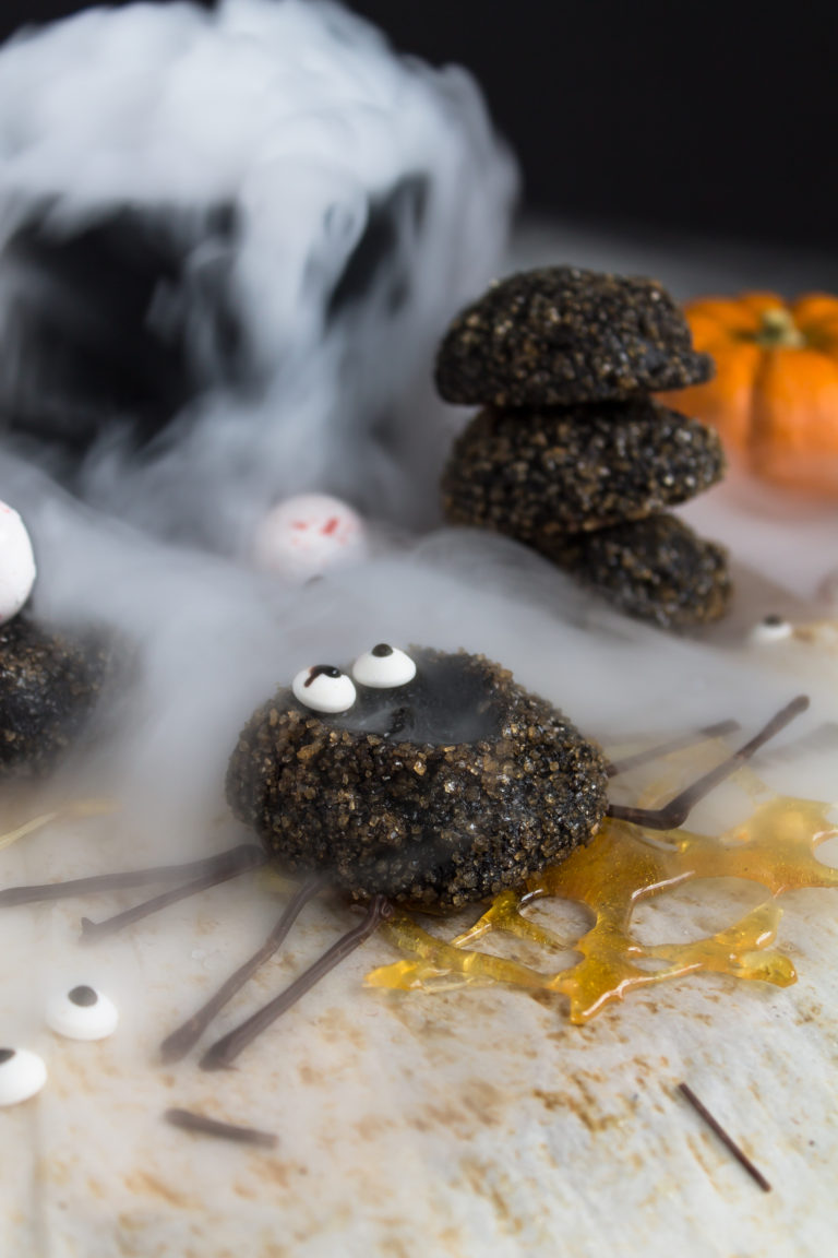 chocolate thumbprint cookie spiders with caramel spider webs - Pass the ...